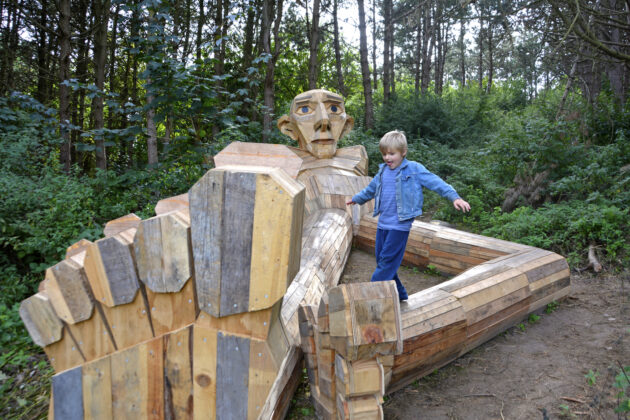 Artist Creates Wooden Giants And Hides Them In Denmark's Wilderness